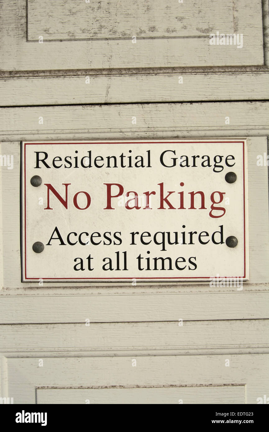 no parking sign stating residential garage, access required at all ...