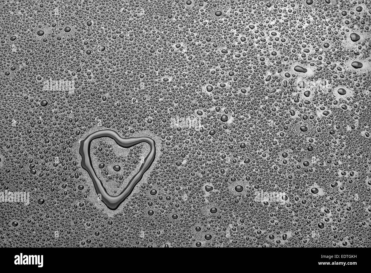heart between water droplets can use as background Stock Photo - Alamy
