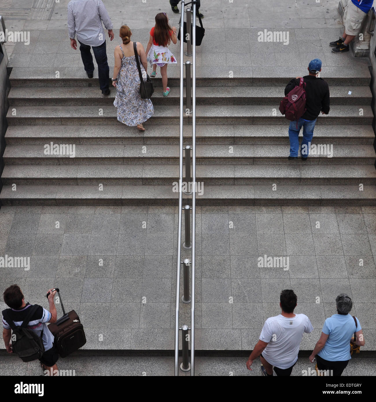 People walking up the stairs of Syntagma metro station. Daily life ...