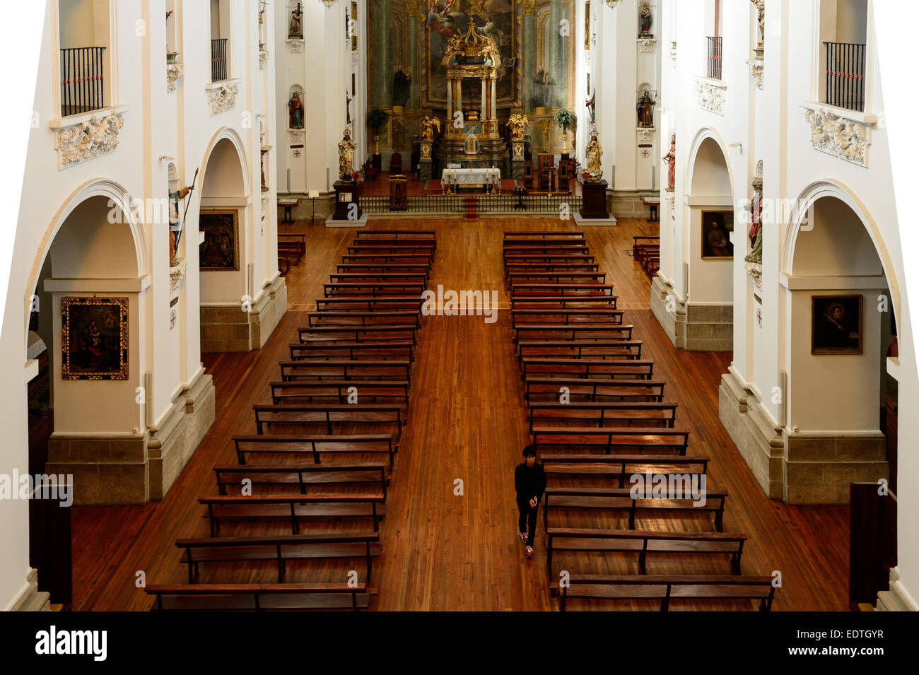 Man walking inside Jesuitas Church Stock Photo - Alamy