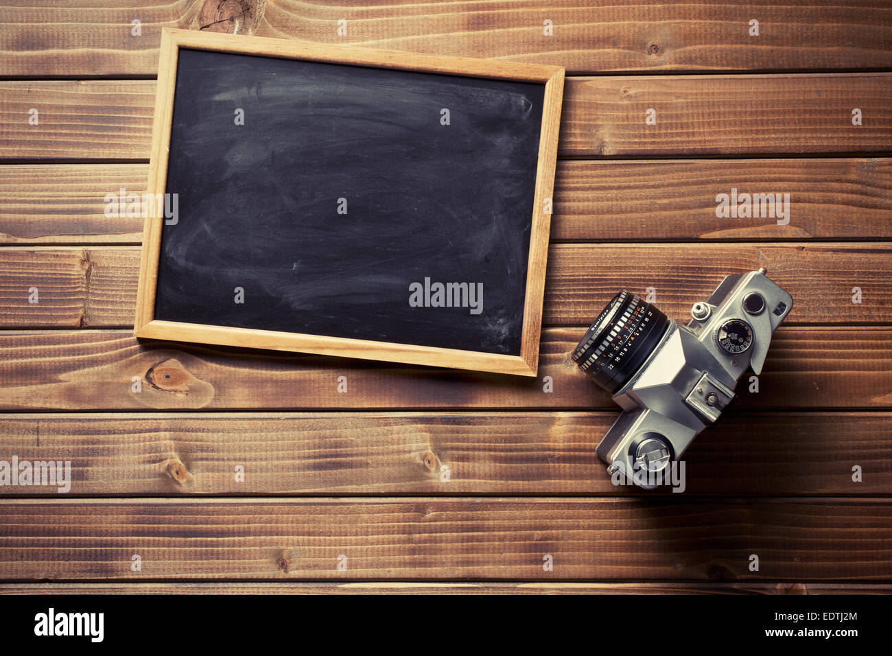 top view of retro camera on wooden table Stock Photo - Alamy