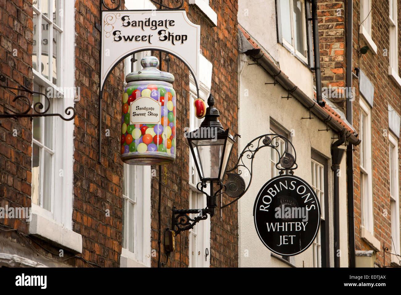 UK, England, Yorkshire, Whitby, Sandgate, ornate shop signs Stock Photo ...