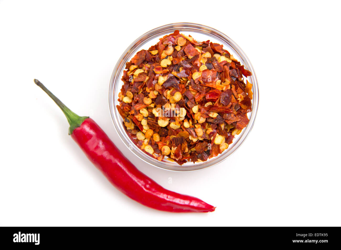 Seen from above ground hot pepper on a white background Stock Photo - Alamy