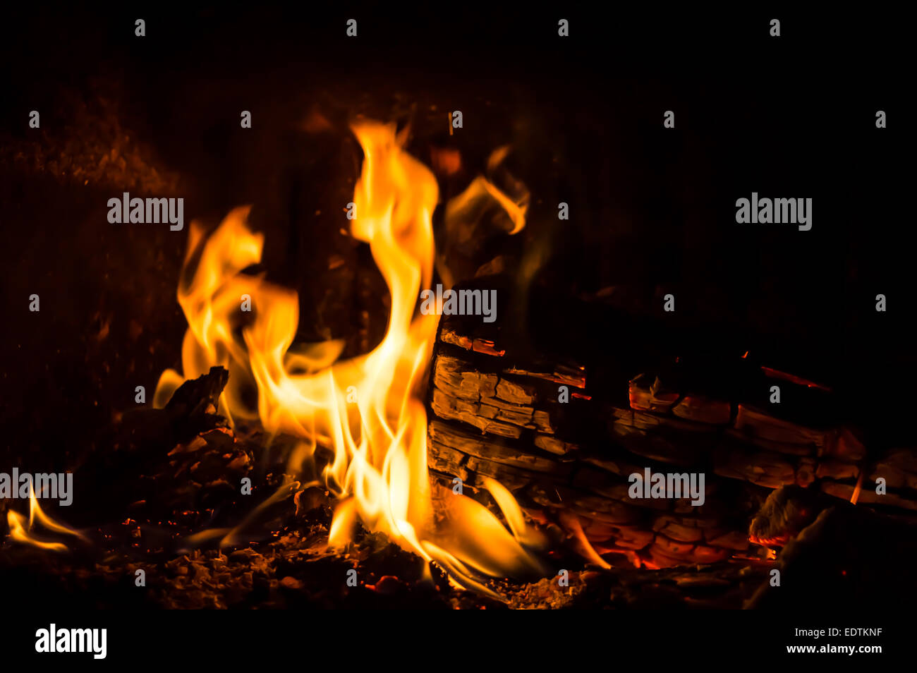 Burning fire in a fireplace Stock Photo - Alamy