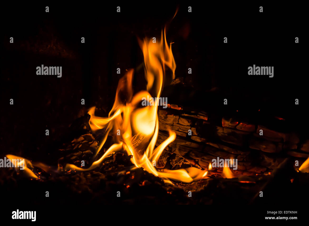 Burning fire in a fireplace Stock Photo - Alamy