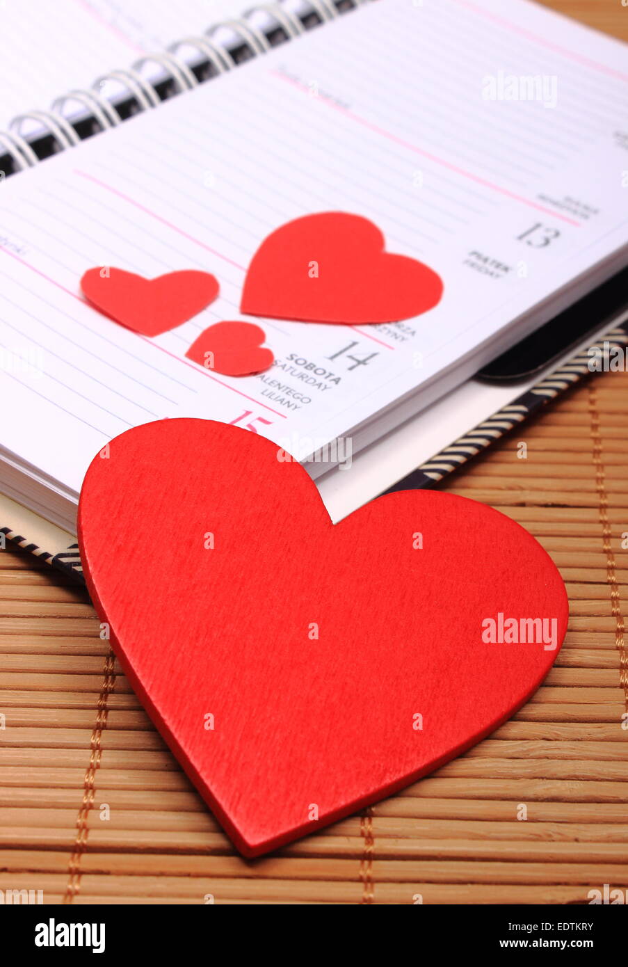 Red hearts for valentines on calendar, detail and concept for ...