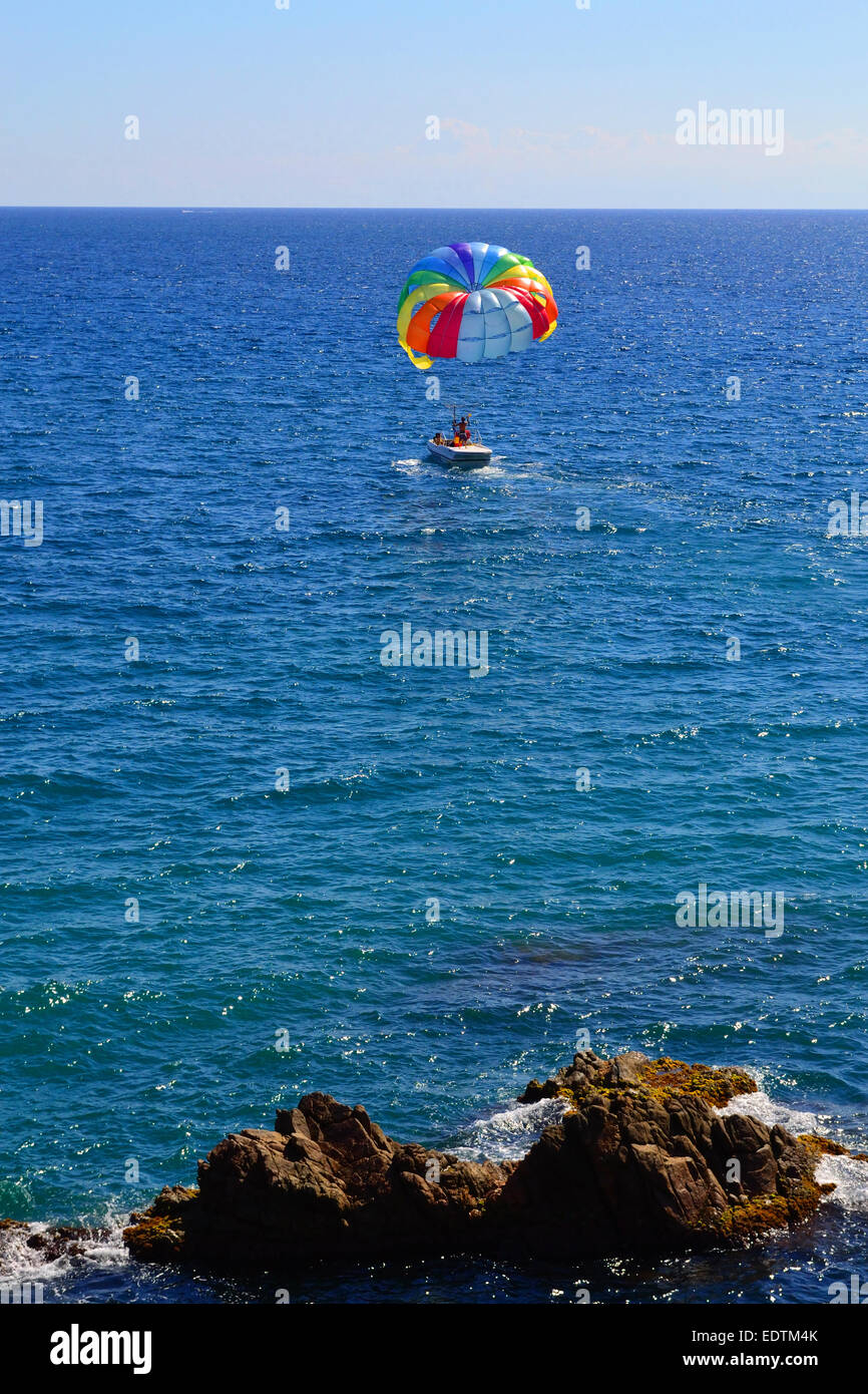 Colored parachute over a sea Stock Photo - Alamy