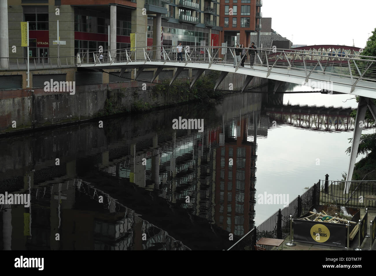 Irwell Footbridge crossing River Irwell with water reflections from ...