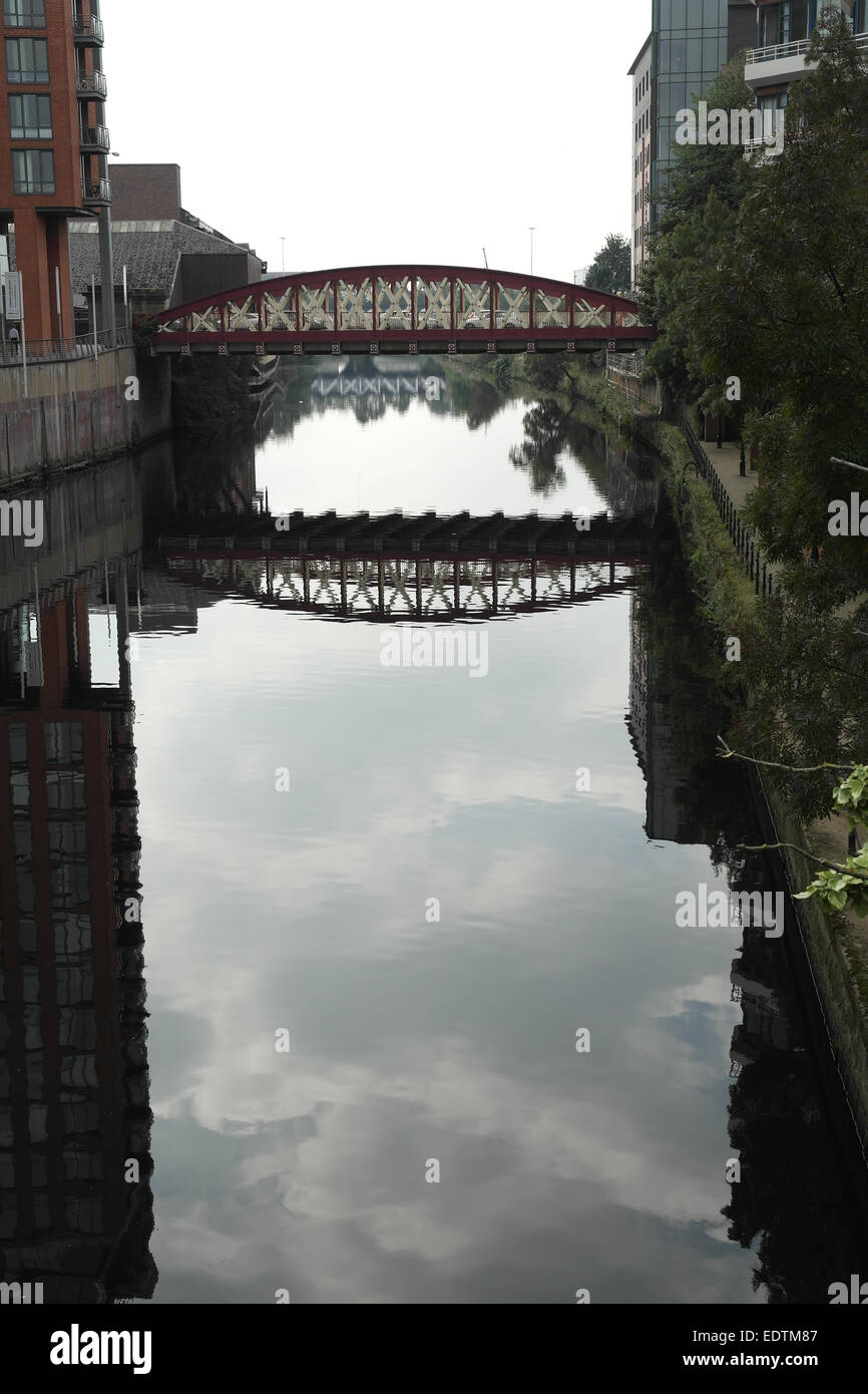 Portrait, towards bow arch Irwell Street Bridge, cumulus clouds and ...