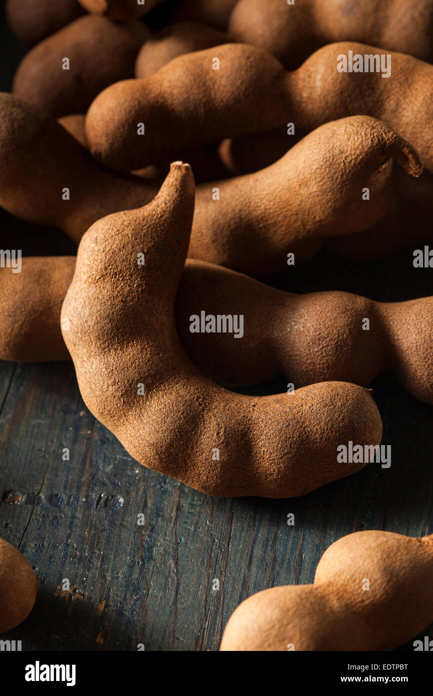 Organic Raw Brown Tamarind on a Background Stock Photo - Alamy