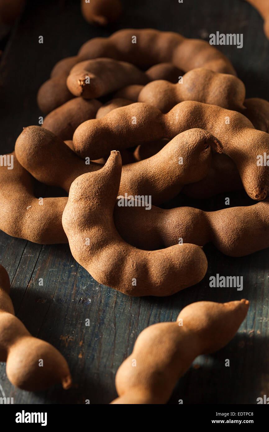 Organic Raw Brown Tamarind on a Background Stock Photo - Alamy
