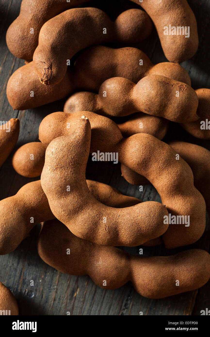 Organic Raw Brown Tamarind on a Background Stock Photo - Alamy