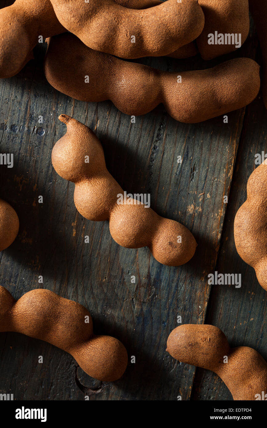 Organic Raw Brown Tamarind on a Background Stock Photo - Alamy