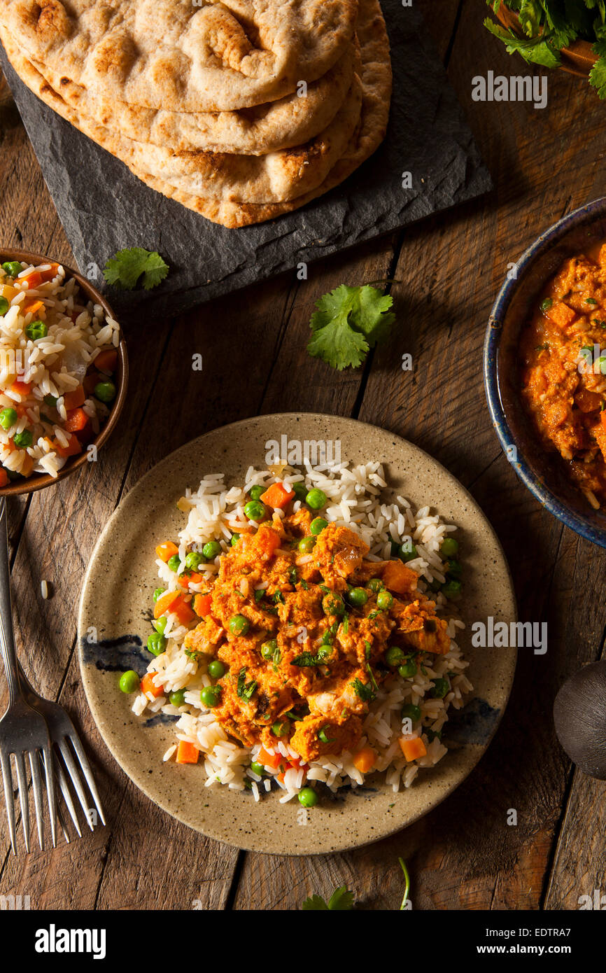 Homemade Chicken Tikka Masala with Rice and Naan Stock Photo - Alamy