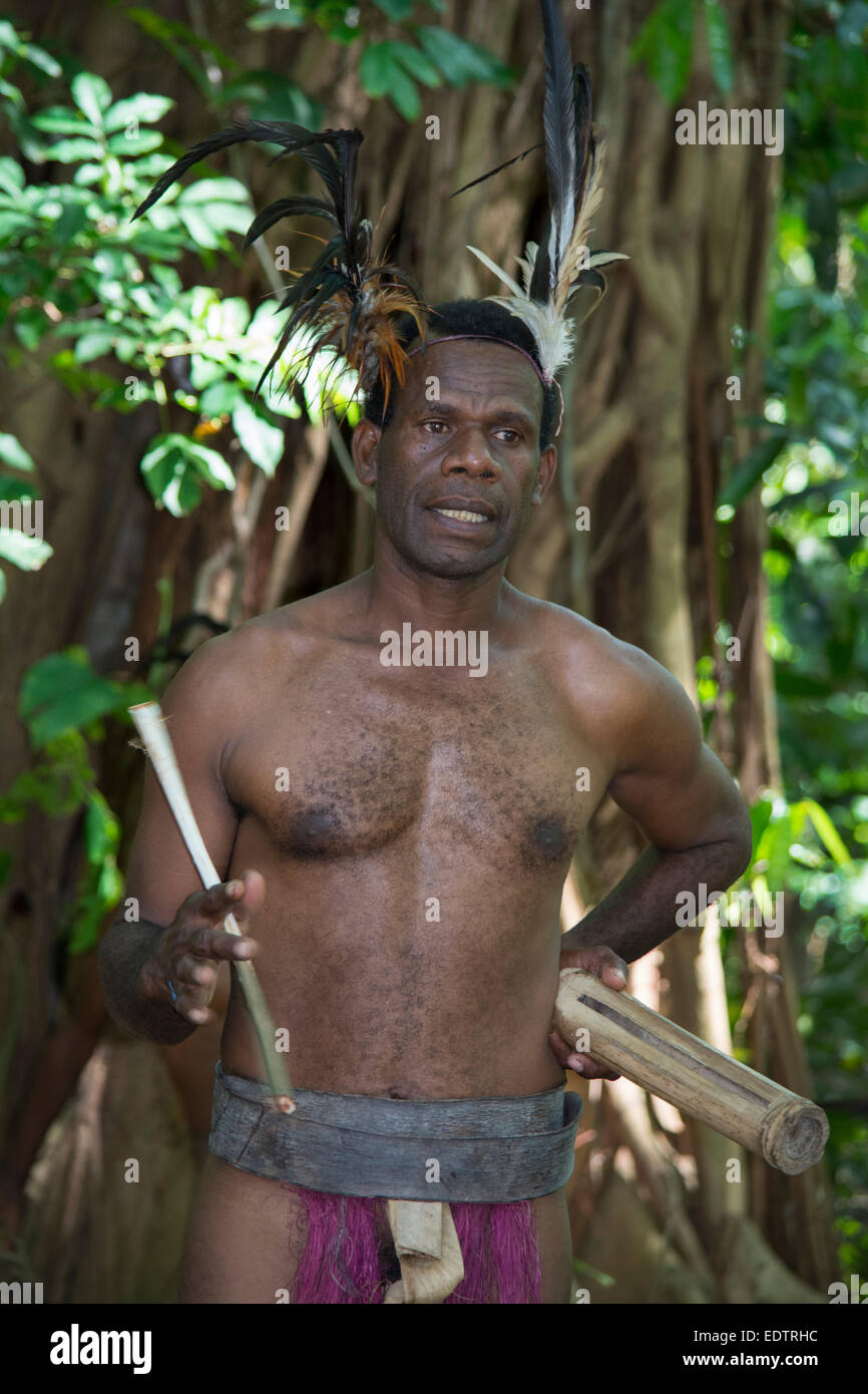 Melanesia, Vanuatu, Rano Island. Village man wearing feather headdress ...