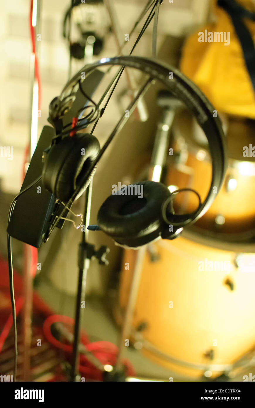 Headphones and music material in a recording studio Stock Photo - Alamy