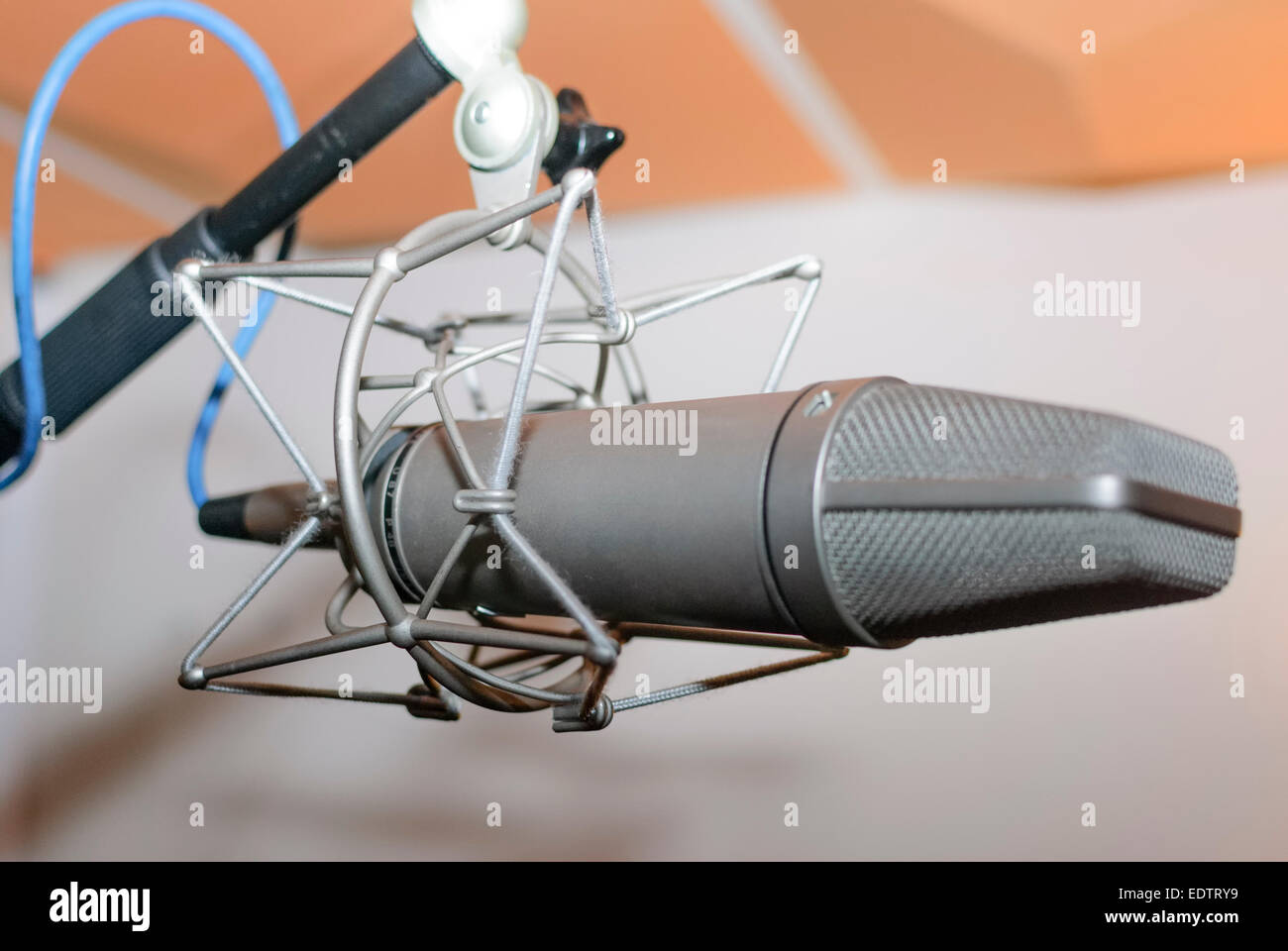 Microphone and music material in a recording studio Stock Photo - Alamy