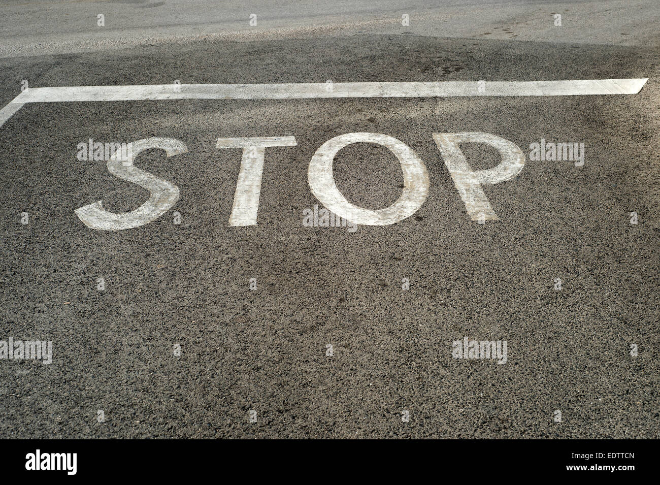 stop sign in the road Stock Photo - Alamy