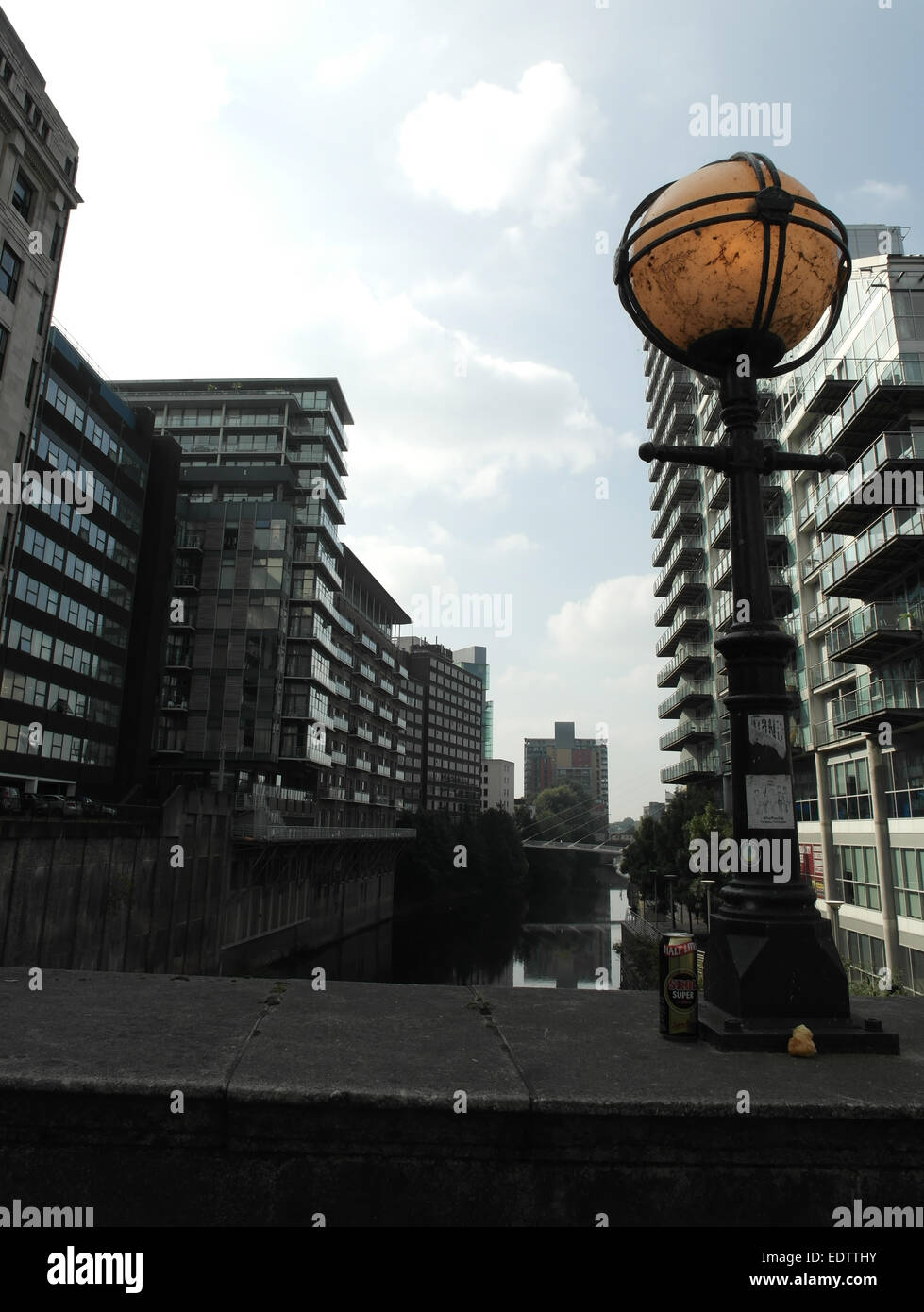 Sunny portrait, to high-rise buildings and Trinity Bridge, beer can by ...
