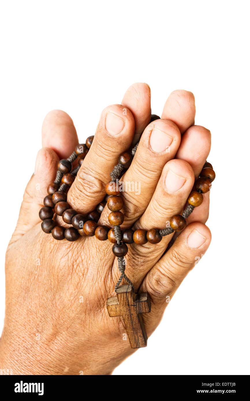 hands of old aged human were binded by wood rosary on white background ...