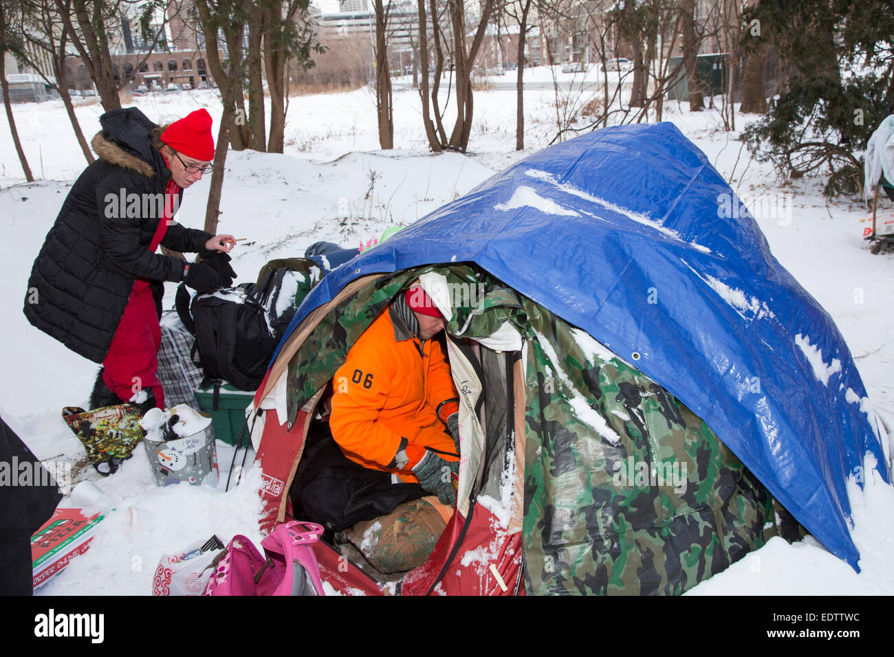 Detroit, Michigan USA - 9 January 2015 - Joshua Messerschmidt (in tent ...
