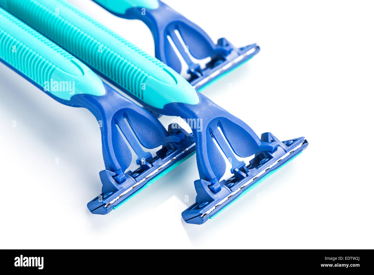 Disposable shaving razors isolated on white Stock Photo - Alamy