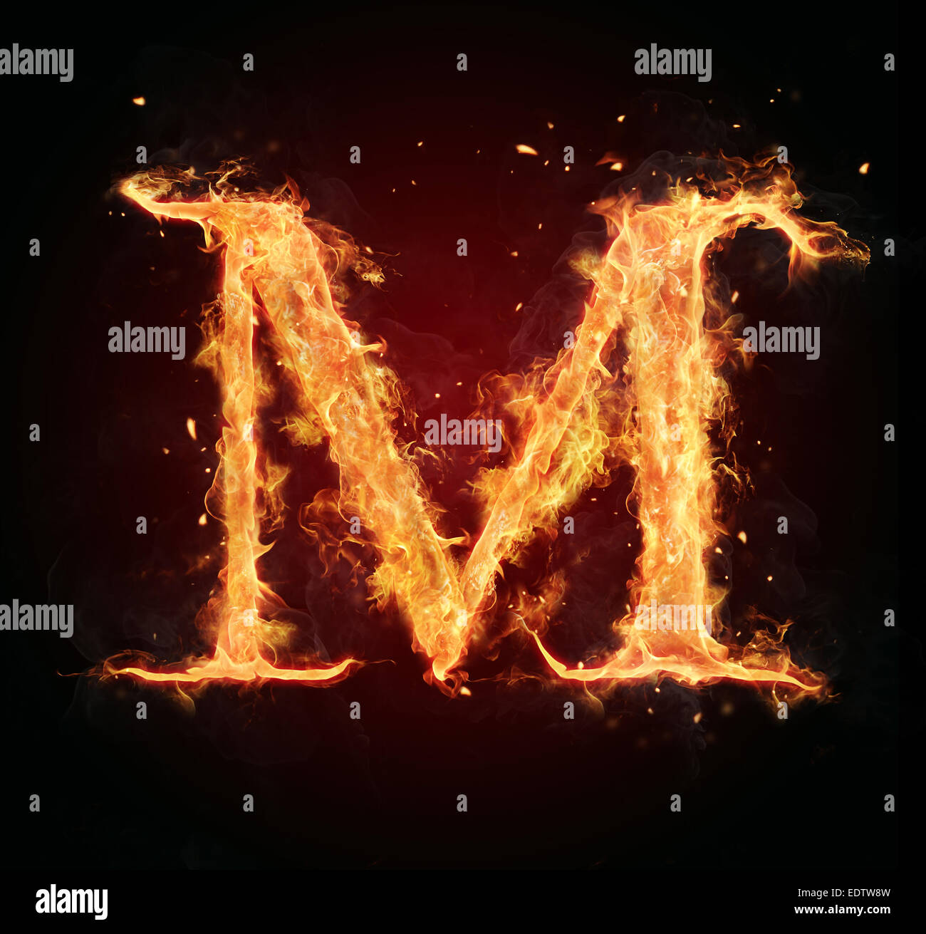 Burning fire letter isolated on black background Stock Photo - Alamy
