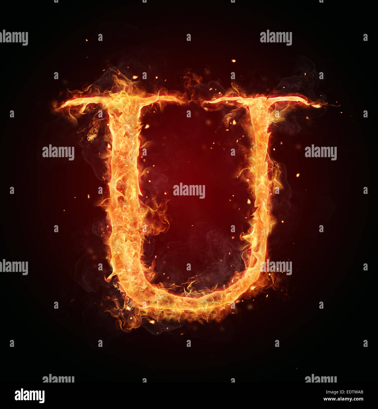 Burning fire letter isolated on black background Stock Photo - Alamy