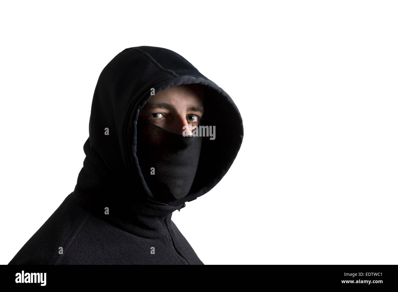 Black dressed hooded and masked man isolated on white background Stock ...