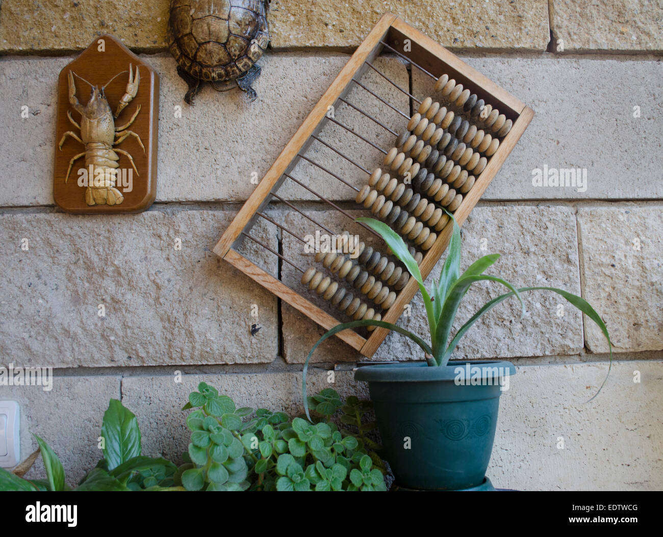 Collage made of obsolete objects on the wall the patio Stock Photo - Alamy