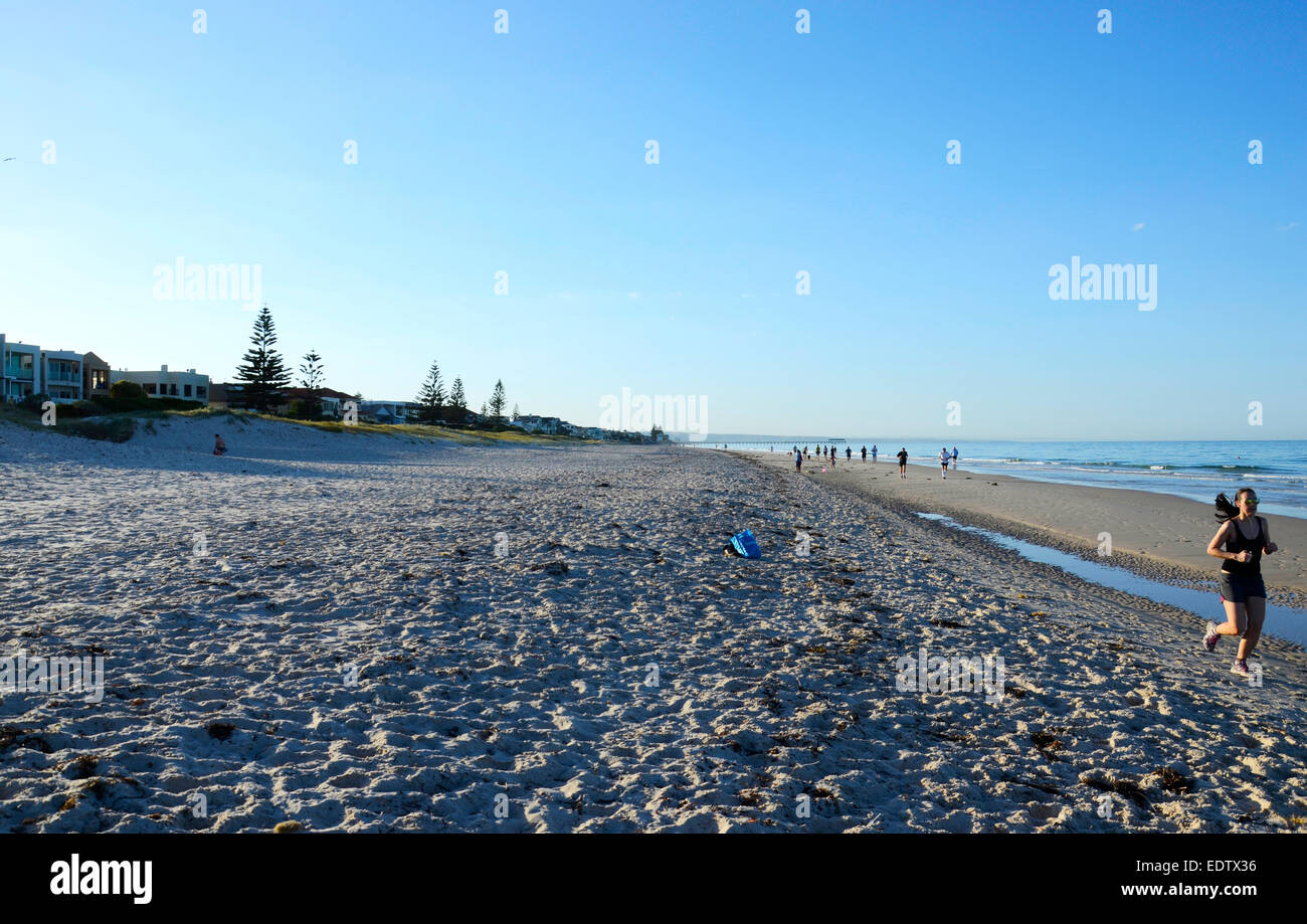 Early morning joggers and people exercising on beautiful wide open ...