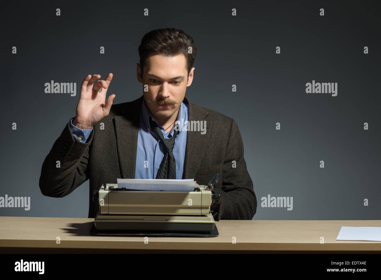 Man typewriter thinking hi-res stock photography and images - Alamy