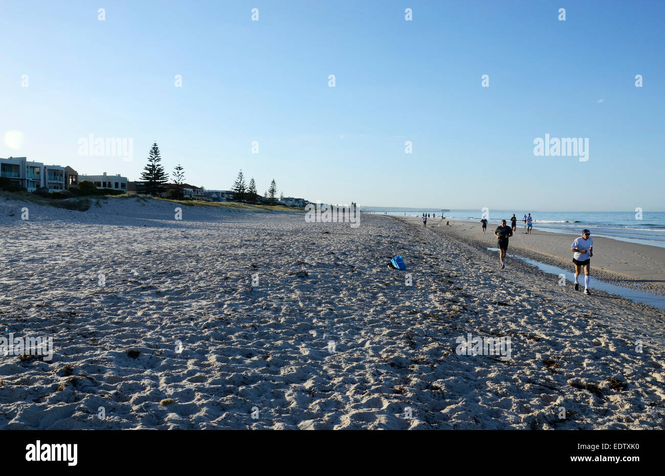 Early morning joggers and people exercising on beautiful wide open ...