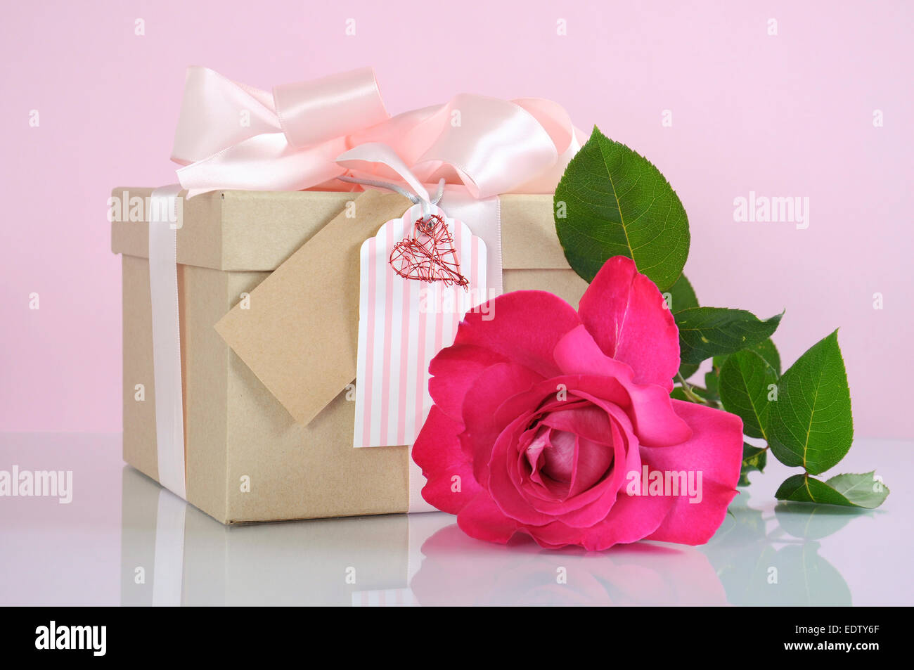 Beautiful classic kraft paper cardboard gift box with pale pink ribbon ...