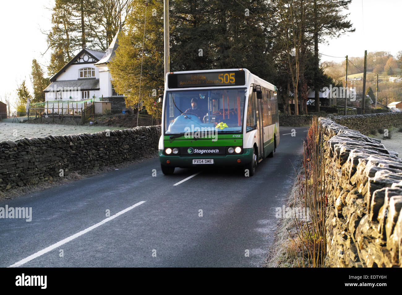 Rural Bus on frosty morning & dry stone walls n Cumbria, England Stock ...