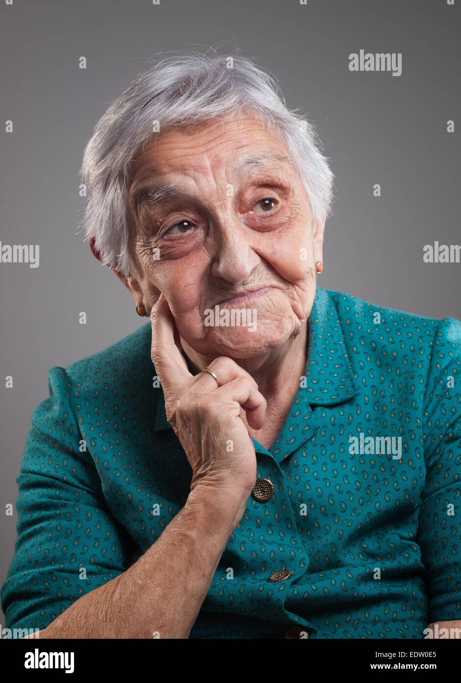 Old woman thinking hi-res stock photography and images - Alamy