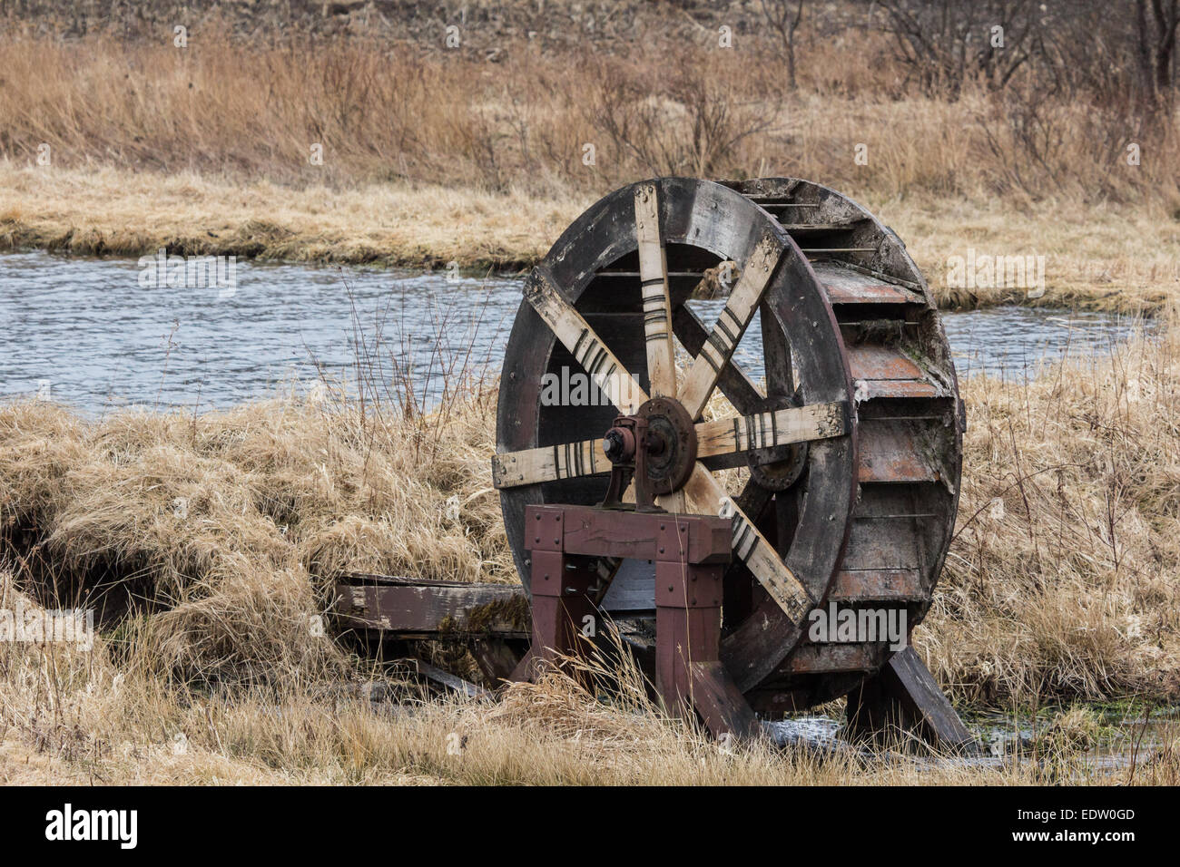A wagon wheel turns in a series of ponds Stock Photo - Alamy
