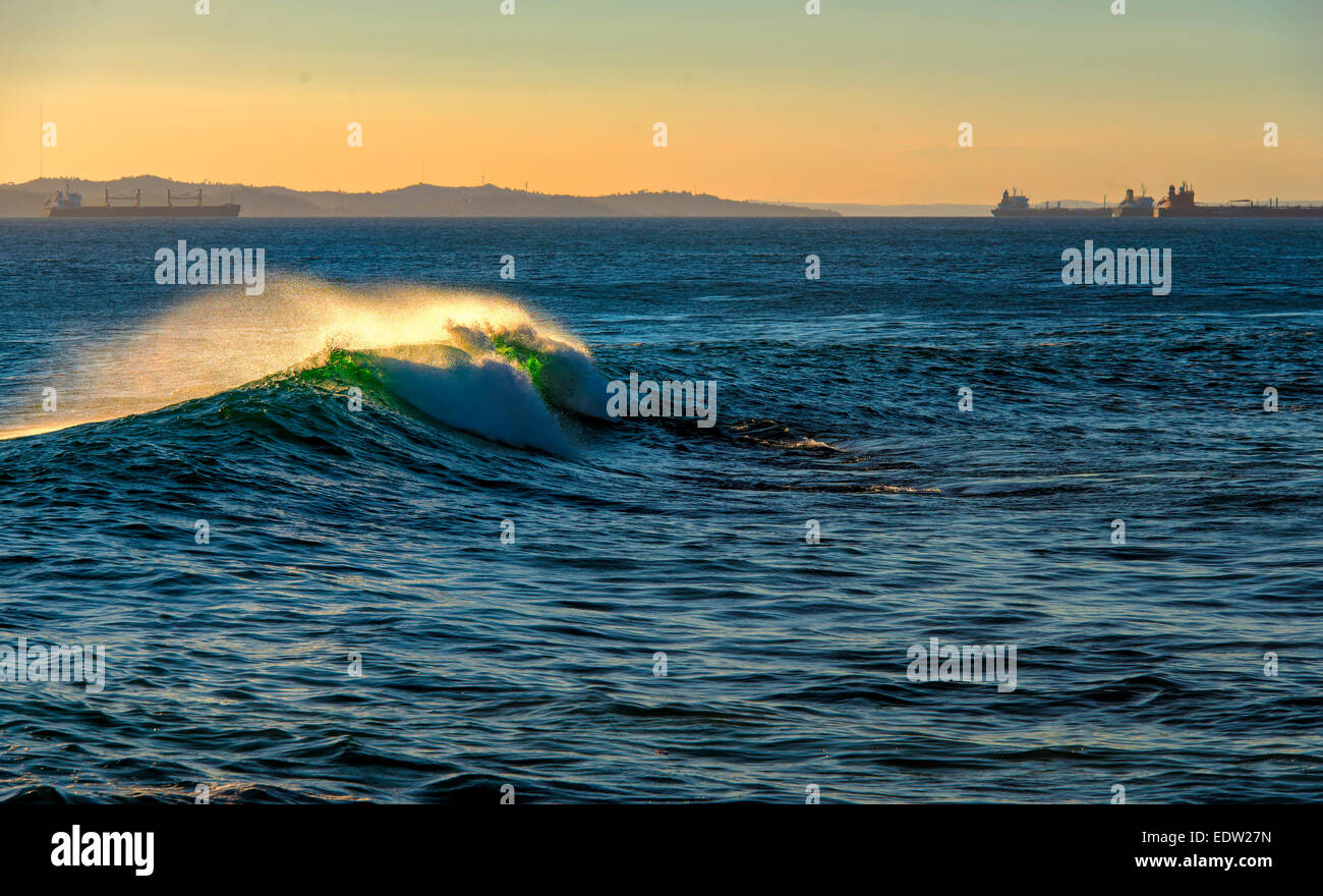 Lonely wave breaking on shore Stock Photo - Alamy