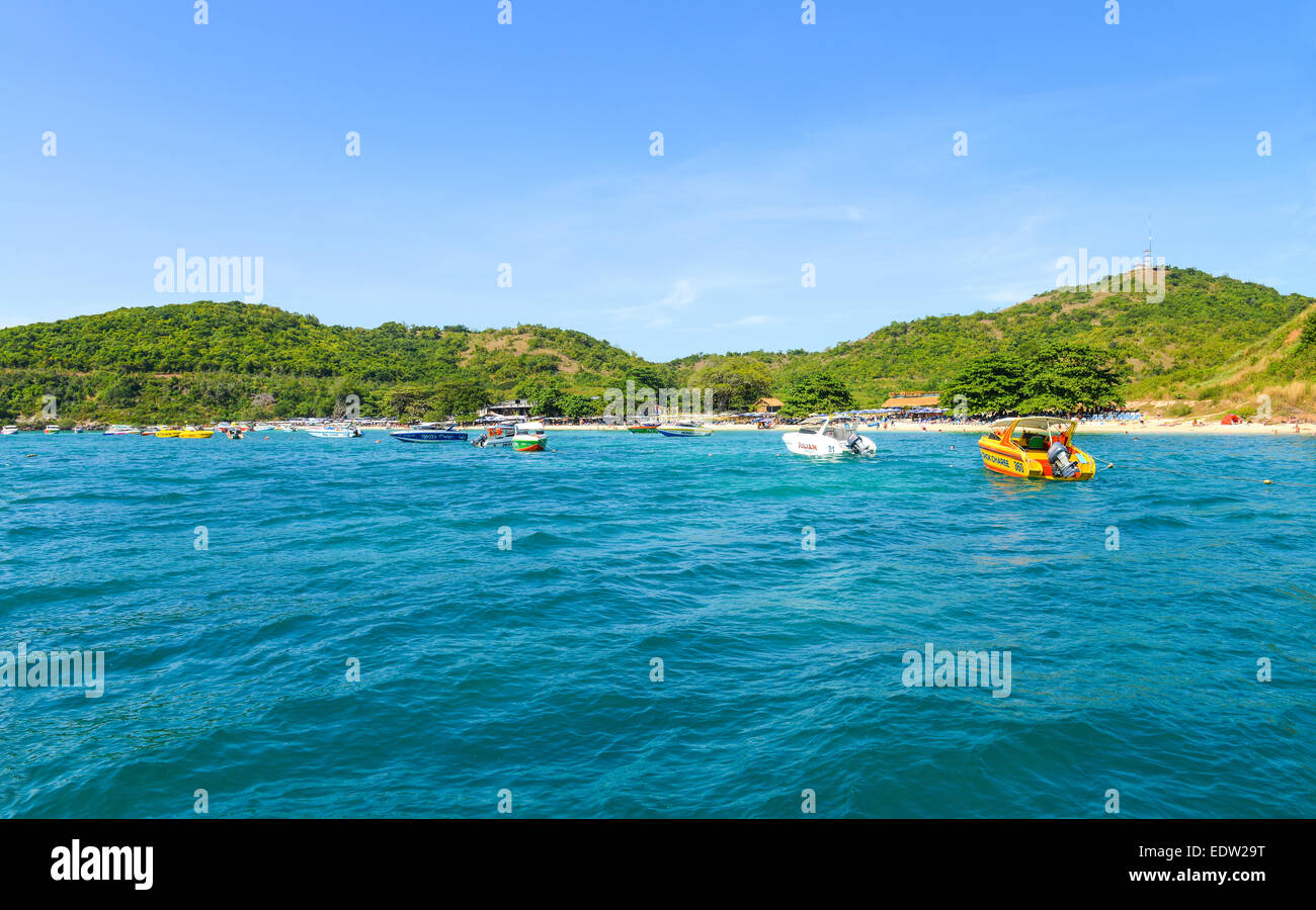 PATTAYA, THAILAND - DECEMBER 29 : Beautiful beach with motor boat at ...