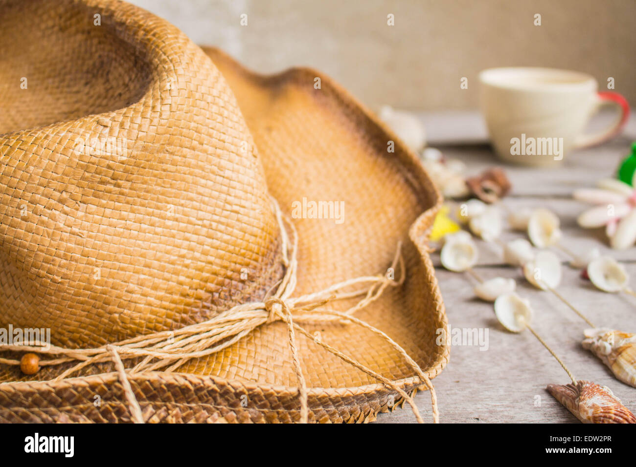 Hat is placed on a wooden table Stock Photo - Alamy