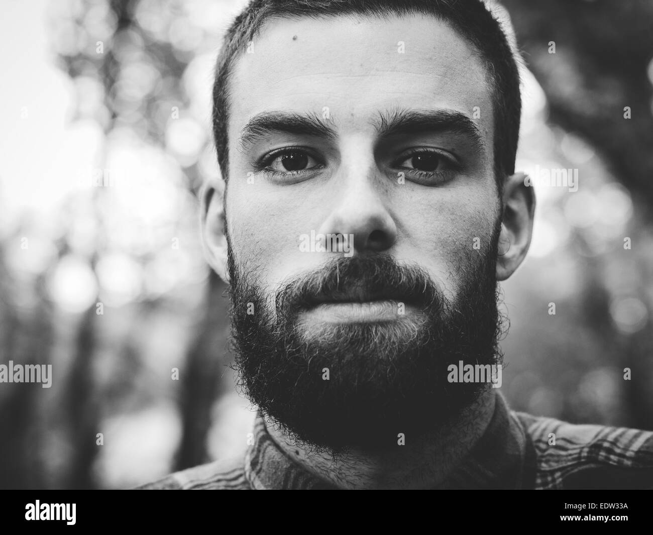 Hipster man portrait in black and white in horizontal composition Stock ...