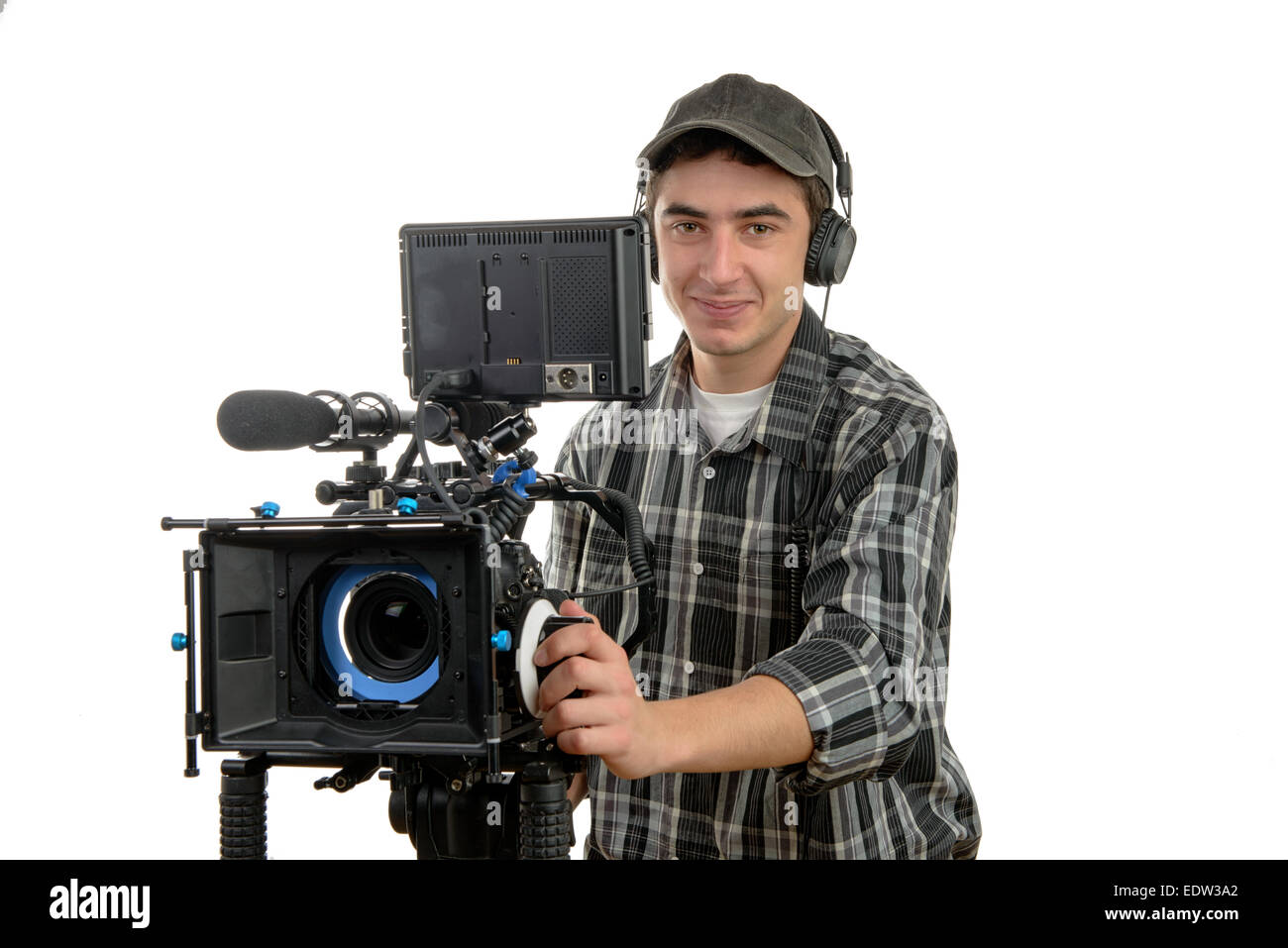 young cameraman with movie camera on the white background Stock Photo ...