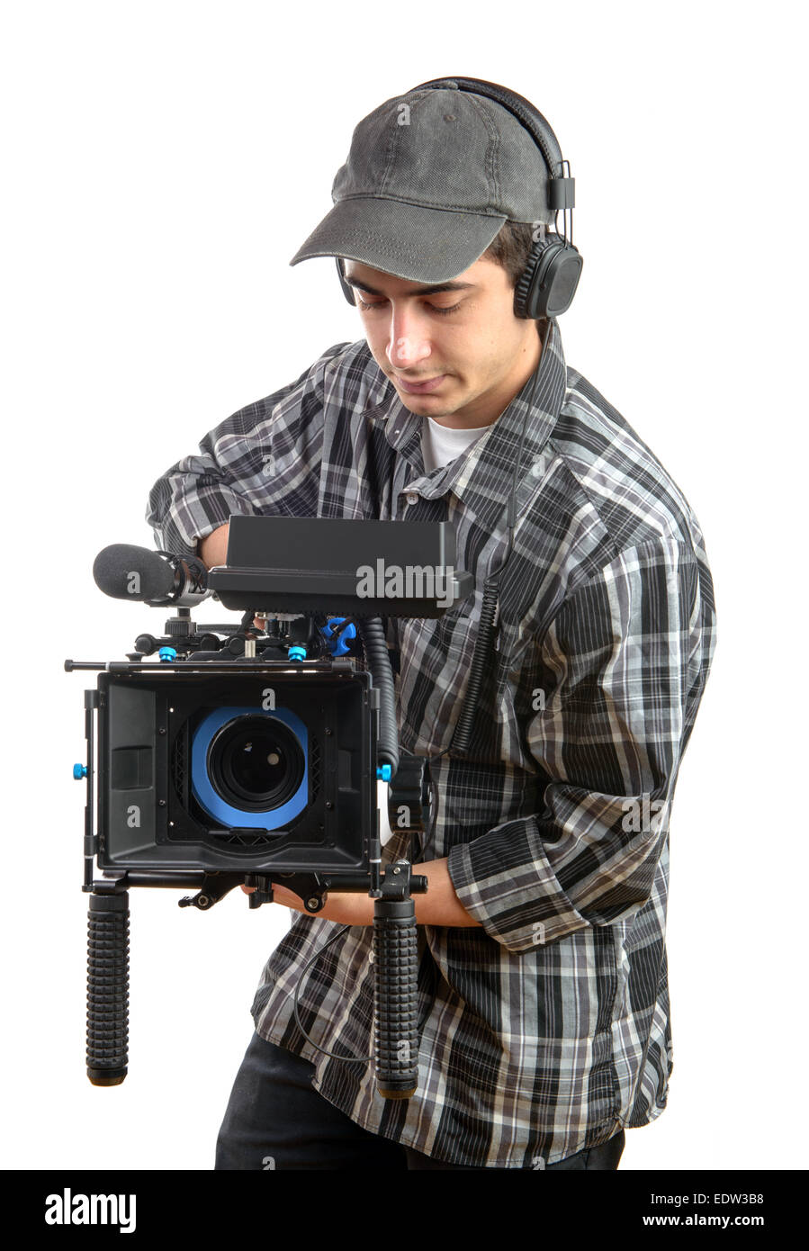 young cameraman with movie camera on the white background Stock Photo ...