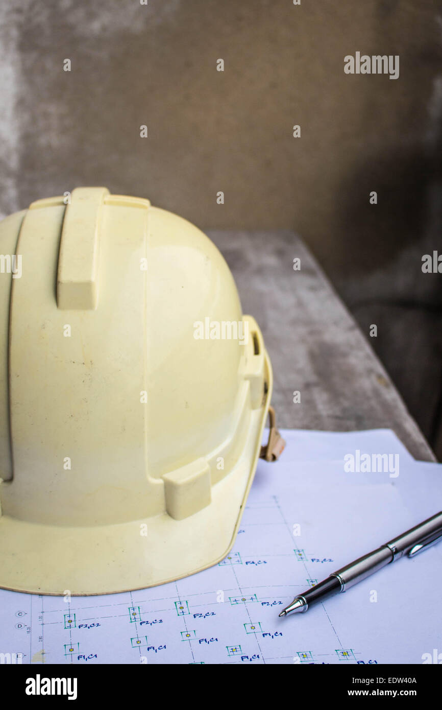 Hats and equipment for construction on the table Stock Photo - Alamy