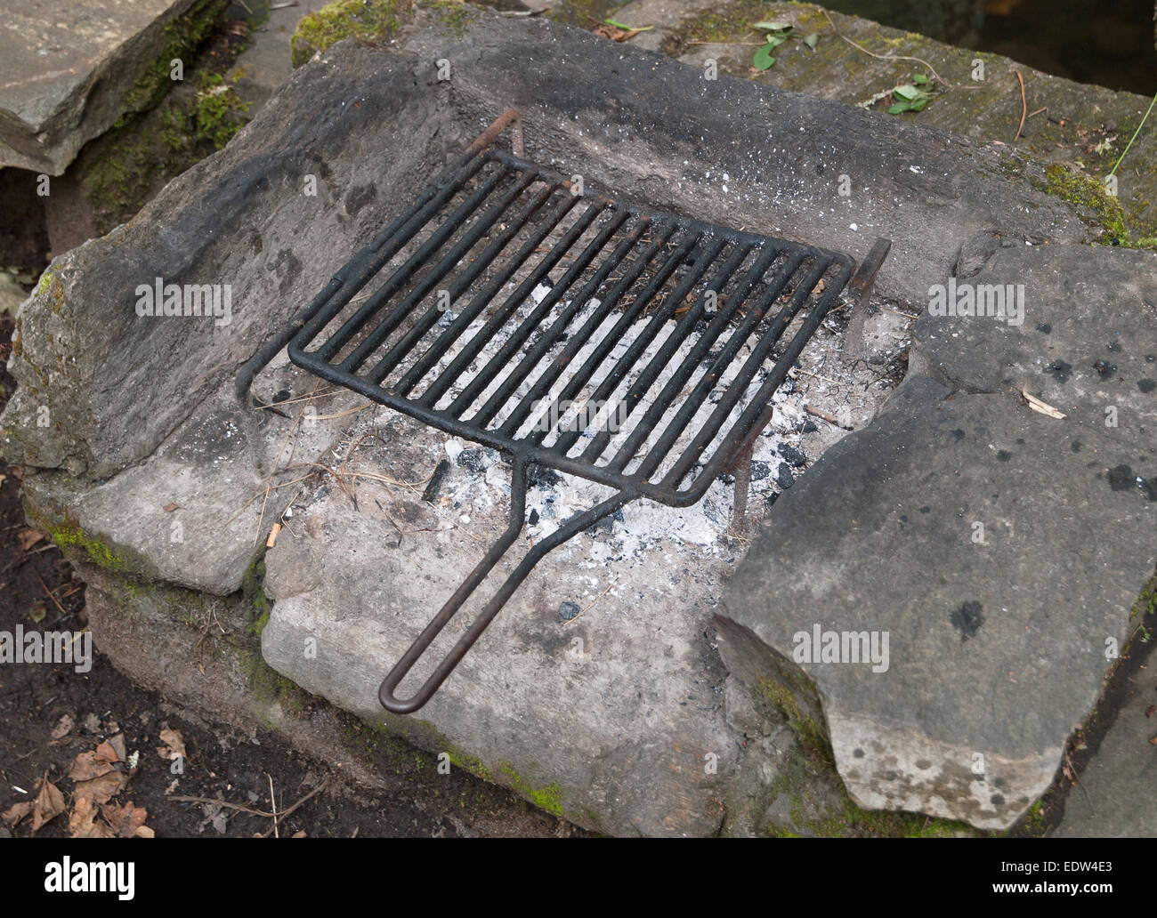 Barbecue off. The photo shows a grill with ashes Stock Photo - Alamy