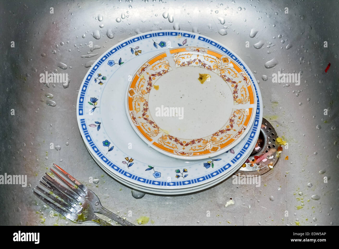 Dirty dishes after family dinner in the sink Stock Photo - Alamy