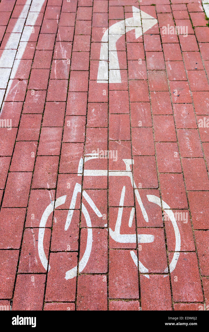Traffic signs for bike path, painted on the pavement, worn Stock Photo ...
