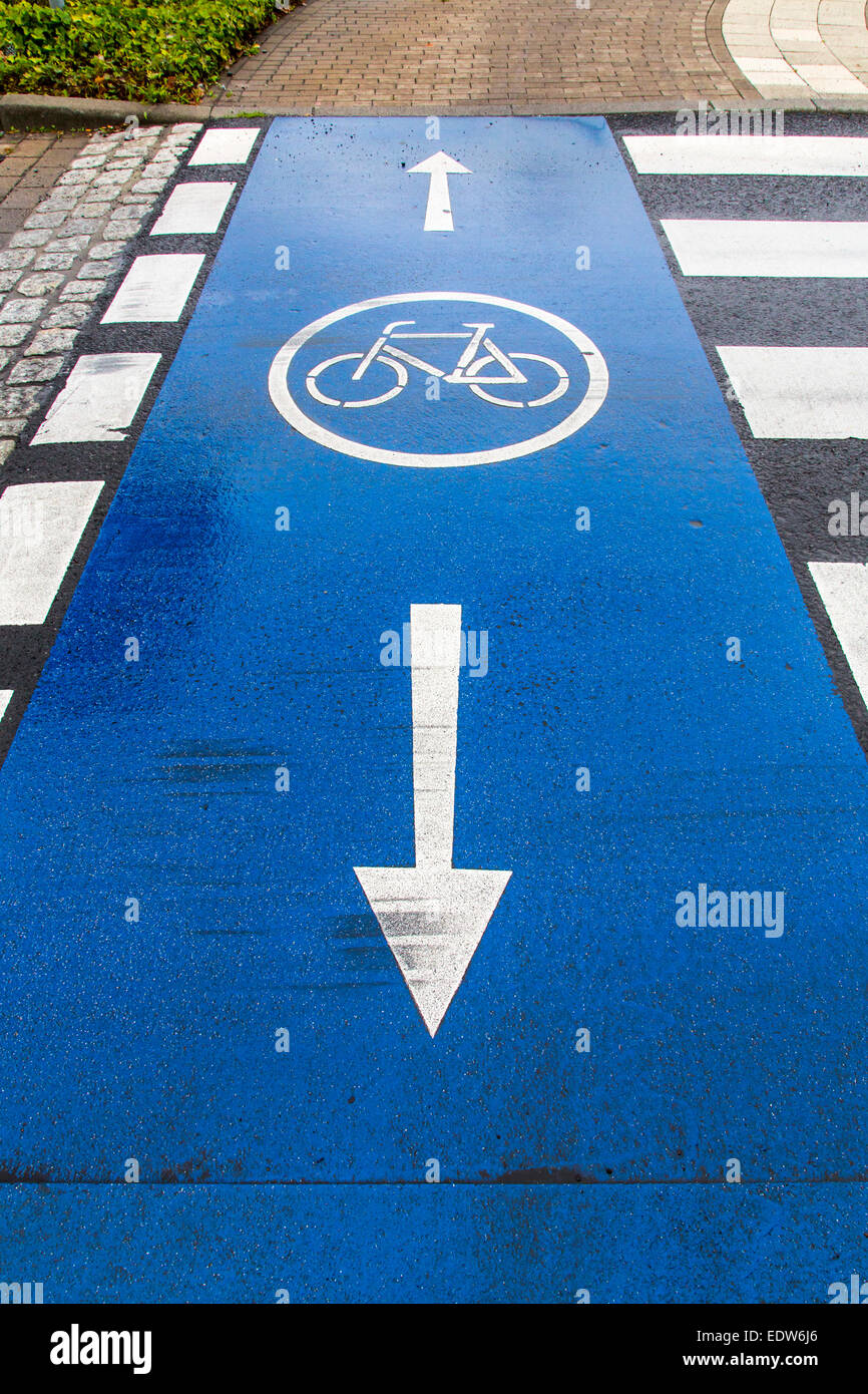 Traffic signs for bike path, painted on the pavement, worn Stock Photo ...
