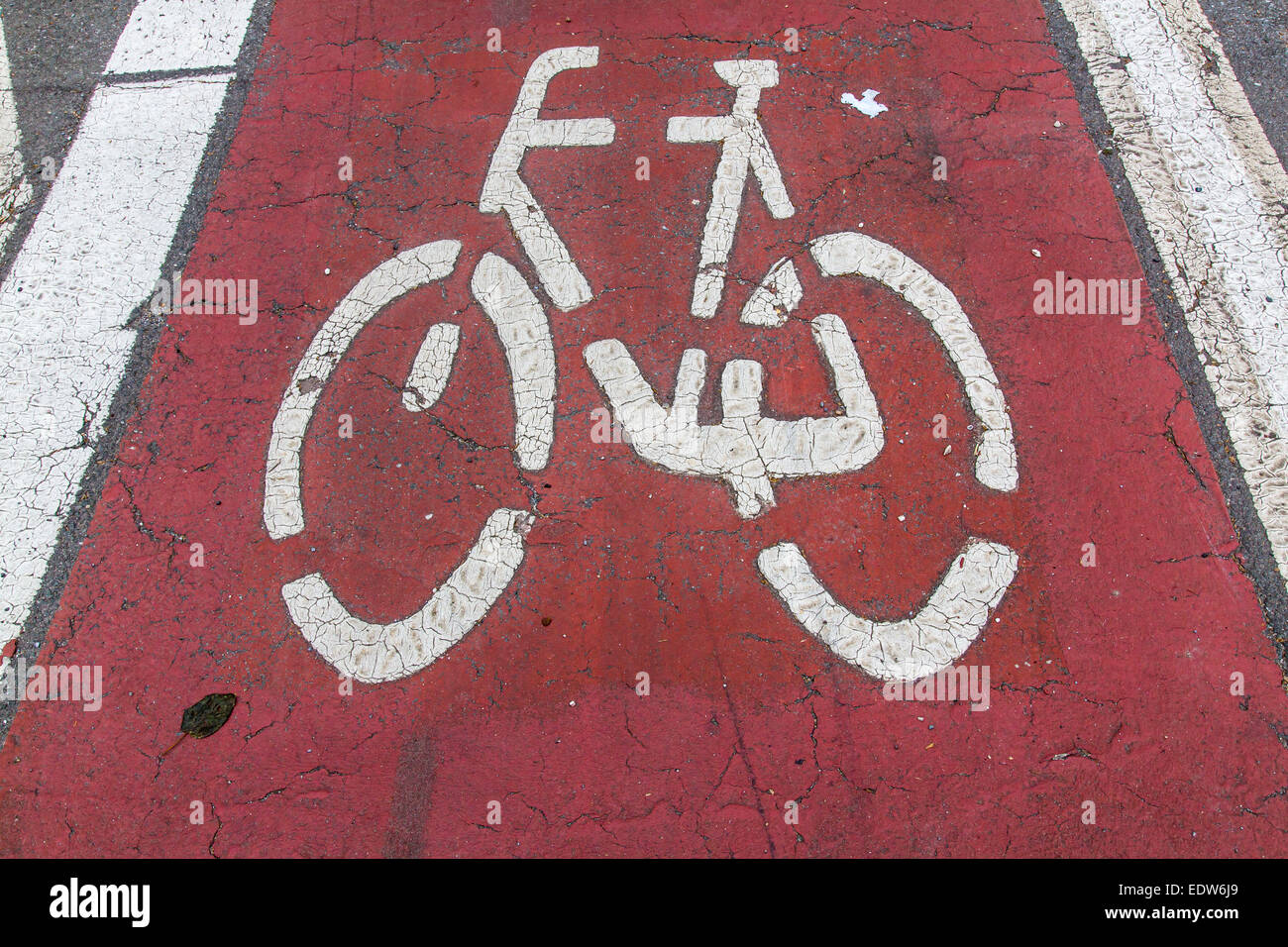 Traffic signs for bike path, painted on the pavement, worn Stock Photo ...