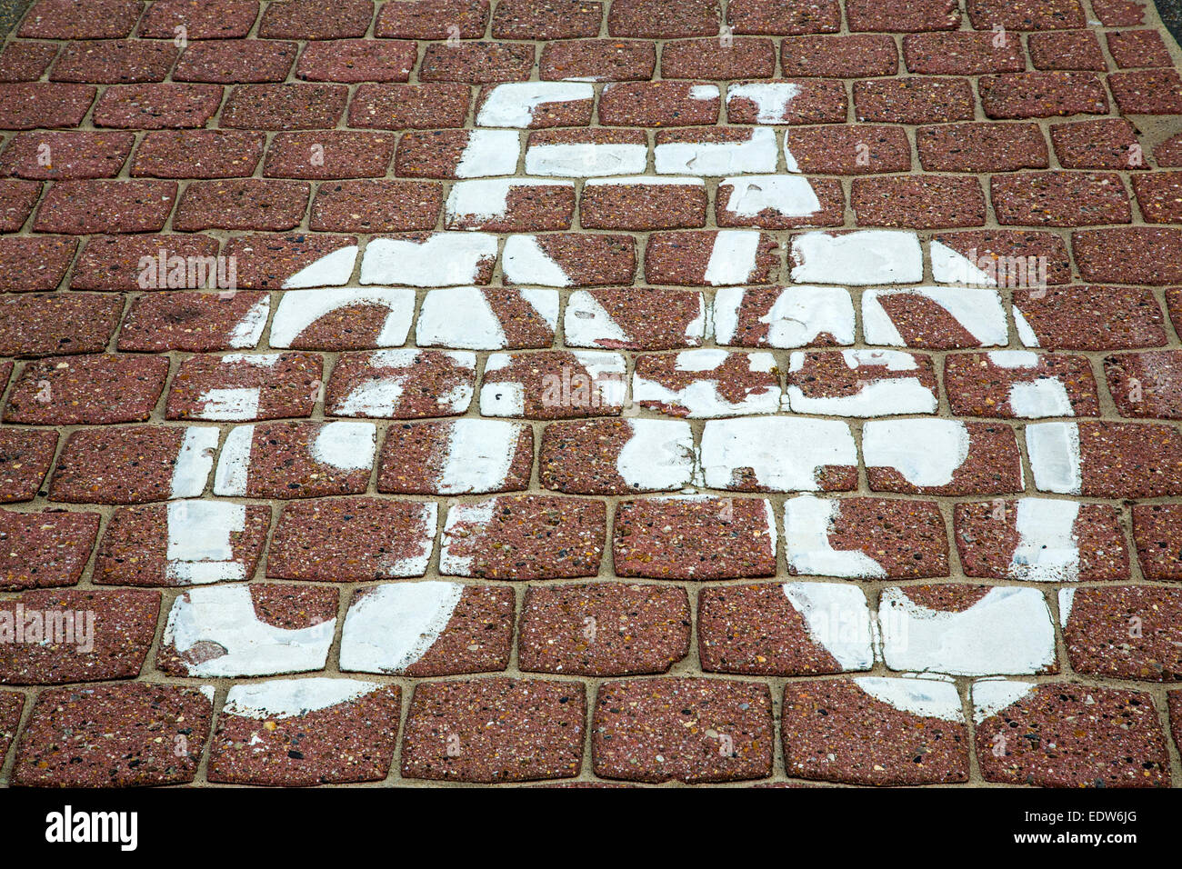 Traffic signs for bike path, painted on the pavement, worn Stock Photo ...